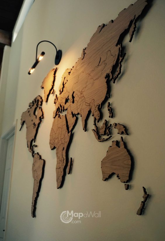 Oak wooden world map in the spotlight | Woodenworldmap.com